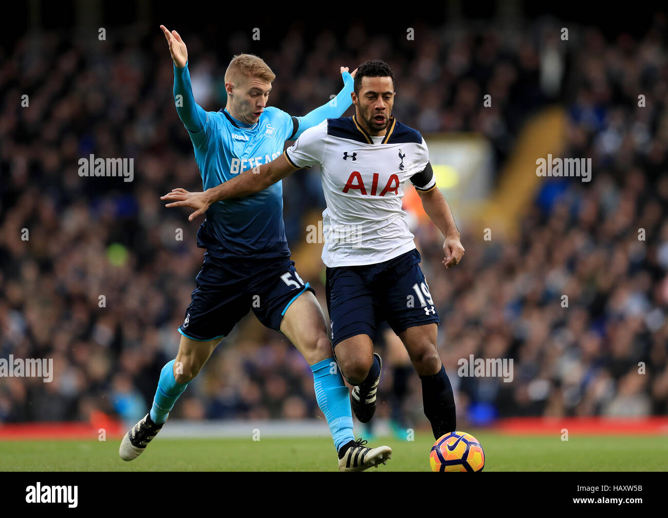 Swansea City's Jay Fulton (left) and Tottenham Hotspur's Mousa Dembele ...