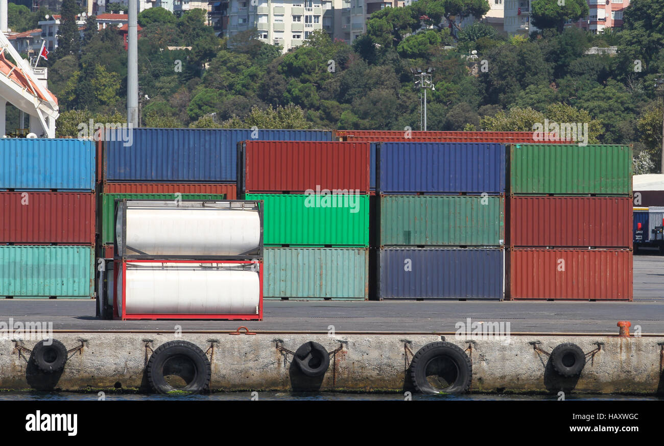 Containers waiting to transfer in a port Stock Photo - Alamy