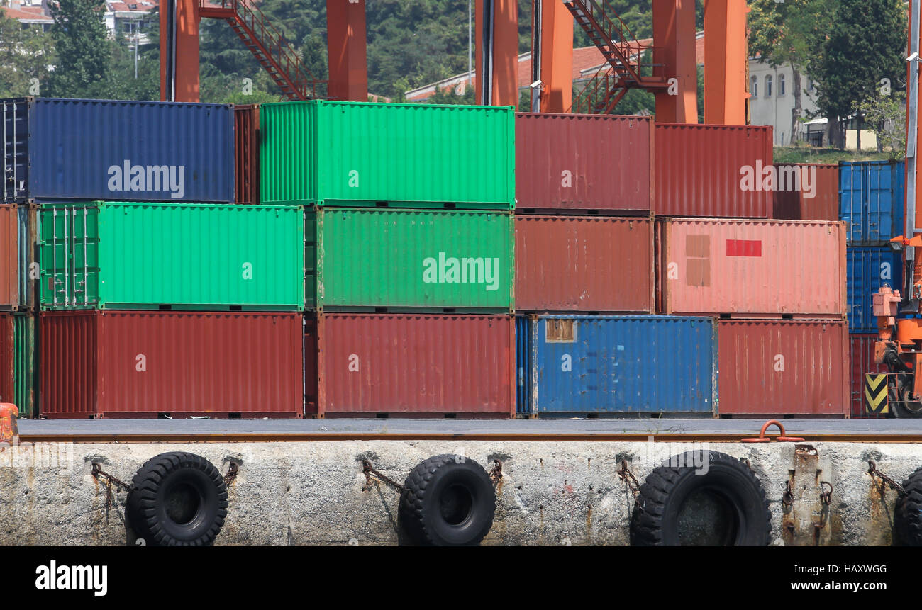 Containers waiting to transfer in a port Stock Photo - Alamy