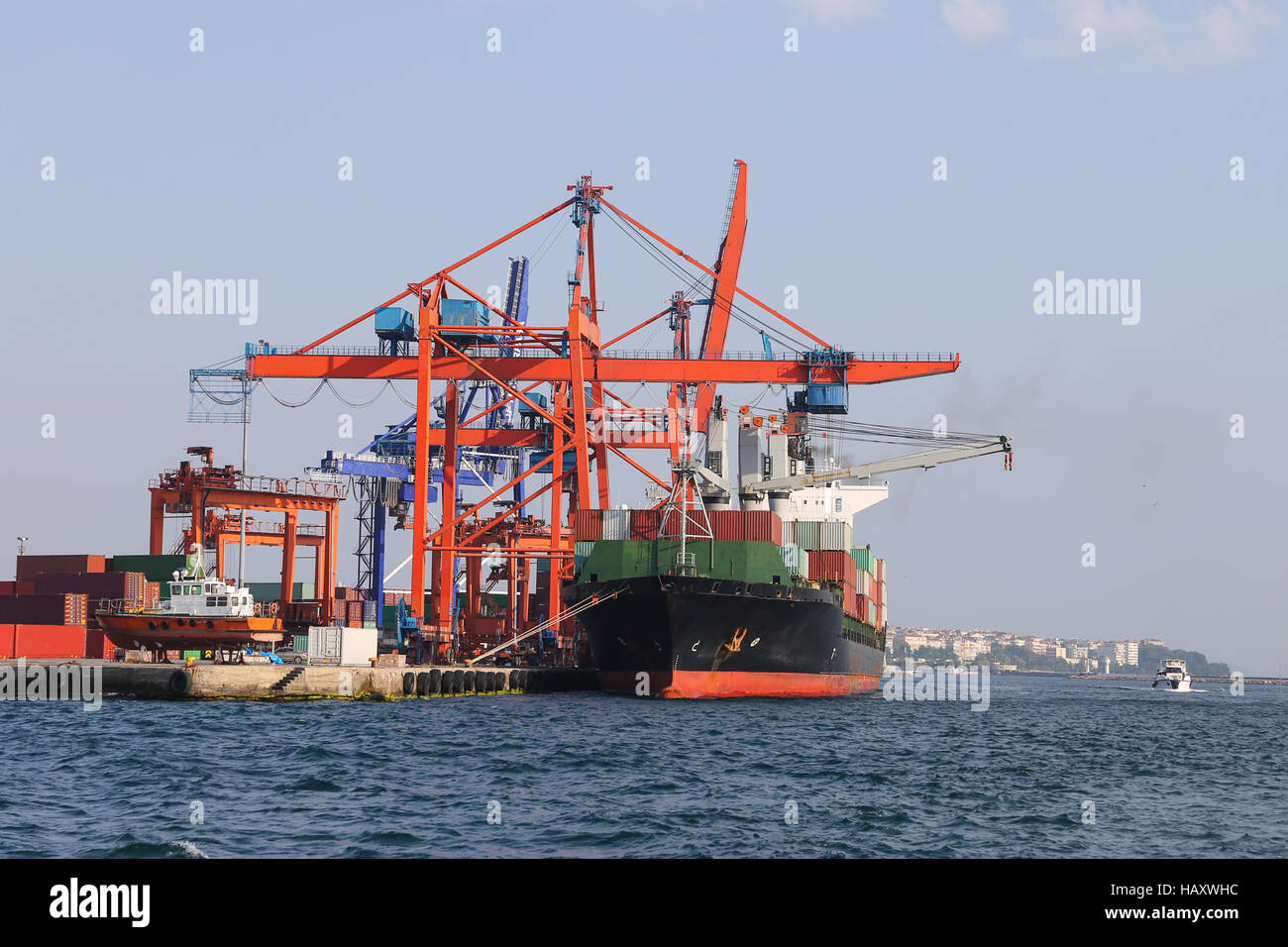 Container Ship is loading in a port Stock Photo - Alamy