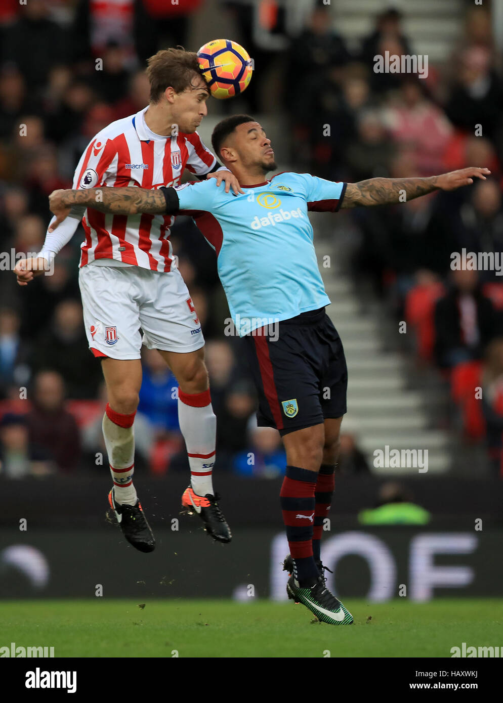 Stoke City's Marc Muniesa (left) and Burnley's Andre Gray (right ...