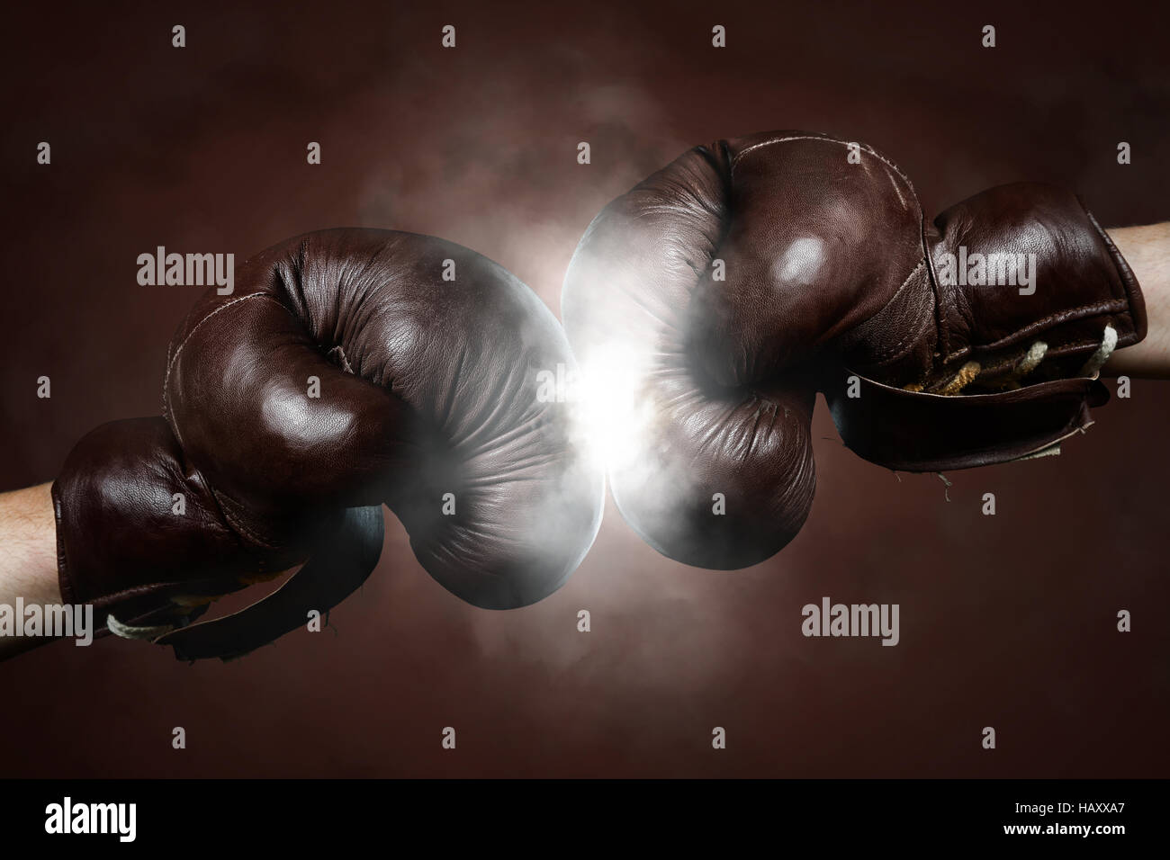 Boxing gloves hit hi-res stock photography and images - Alamy