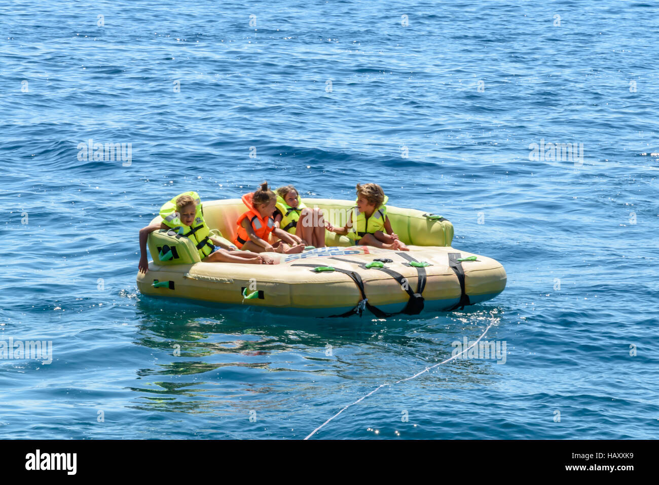 Children on float hi-res stock photography and images - Alamy