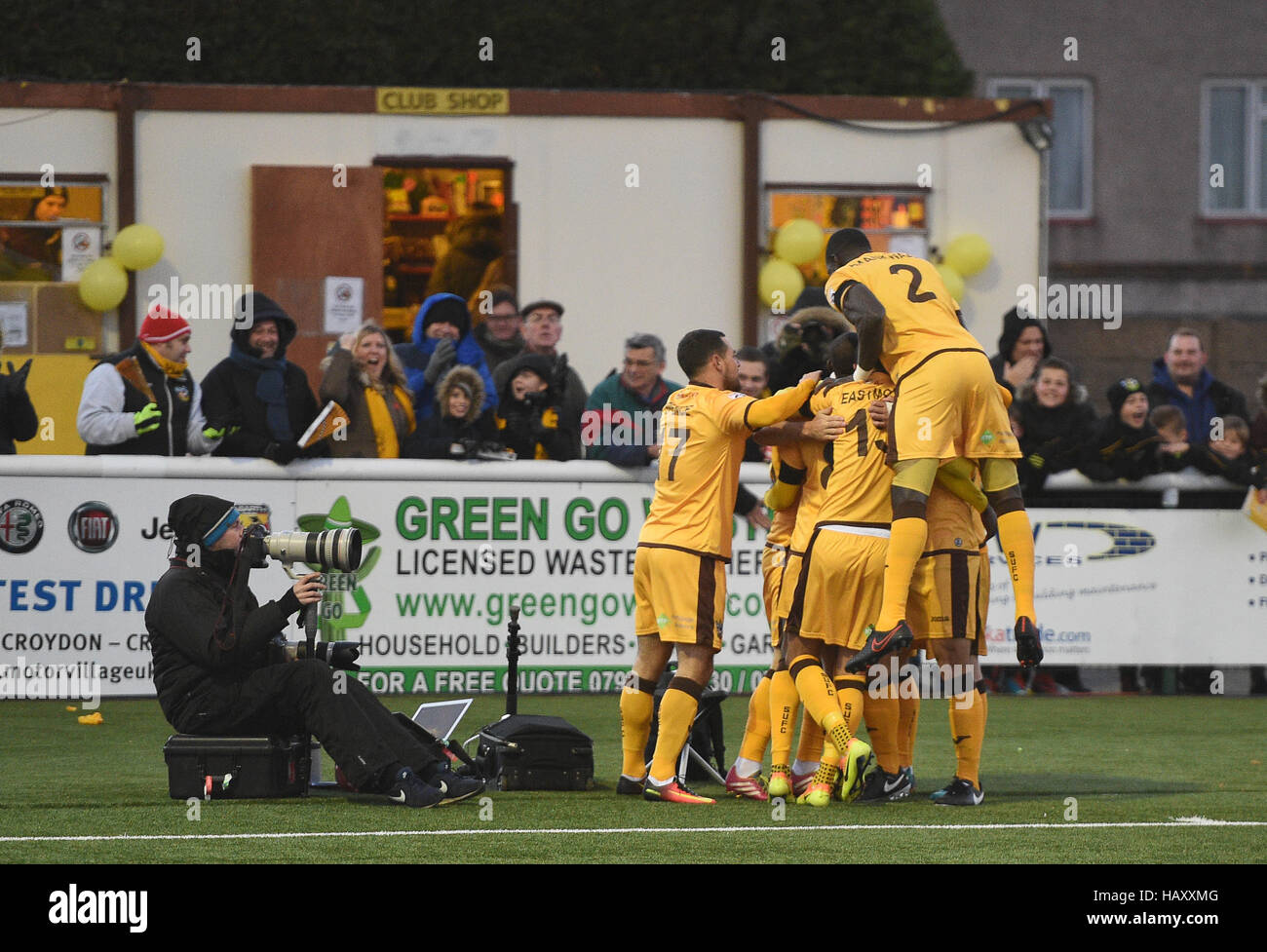 Sutton United's Matt Tubbs (hidden) celebrates scoring their first goal ...