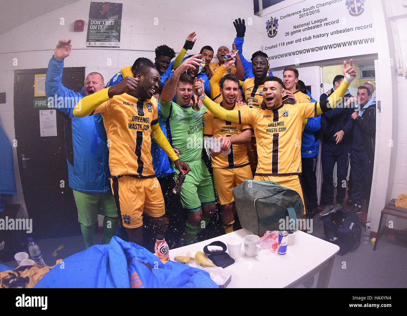 The players of Sutton United celebrate in the changing room after ...