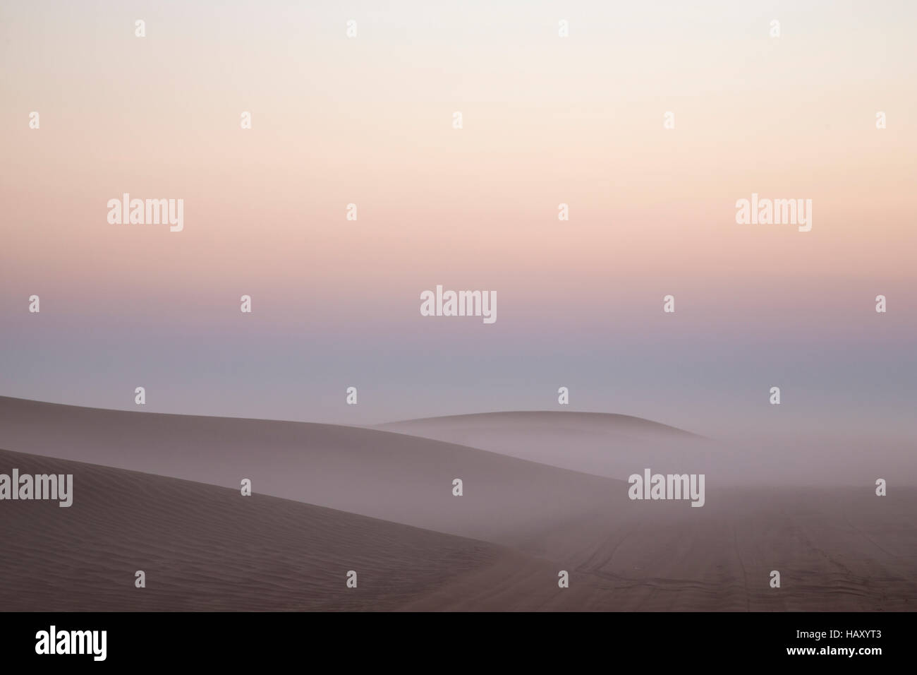 Mist in a desert at sunrise near Dubai, UAE Stock Photo - Alamy