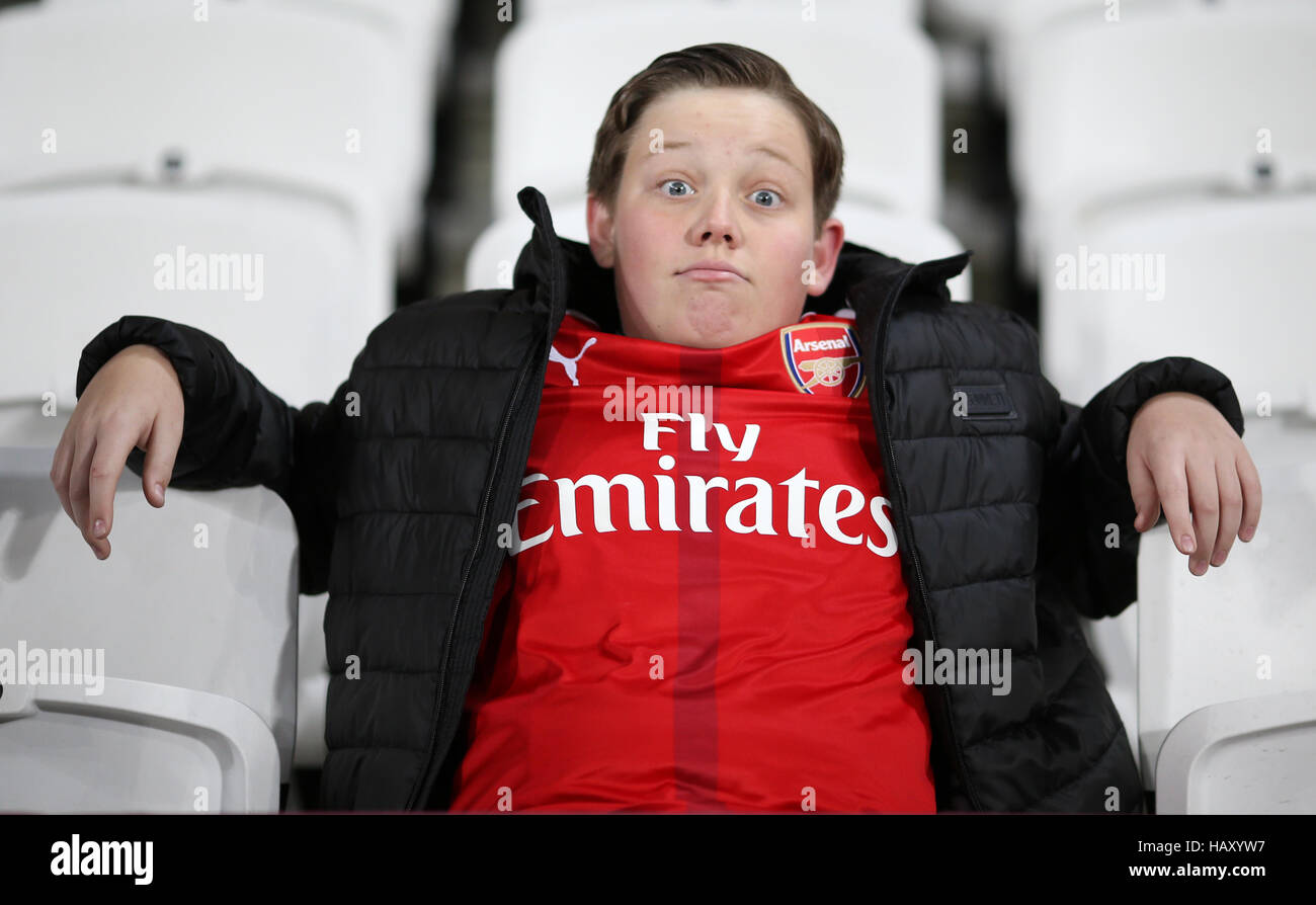 An Arsenal fan in the stand during the Premier League match at the ...