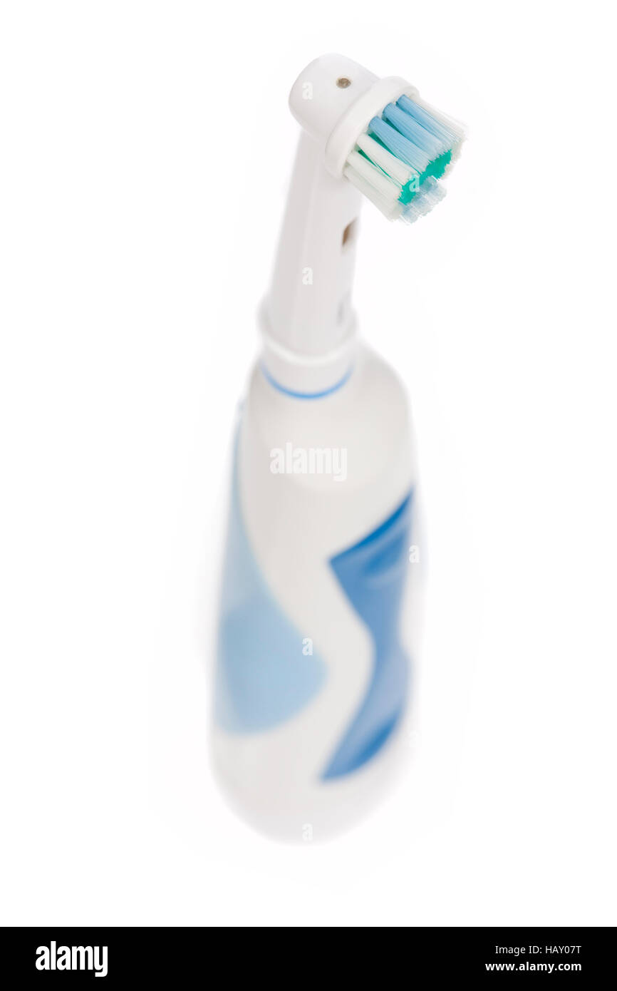 Electric toothbrush isolated on white background Stock Photo - Alamy