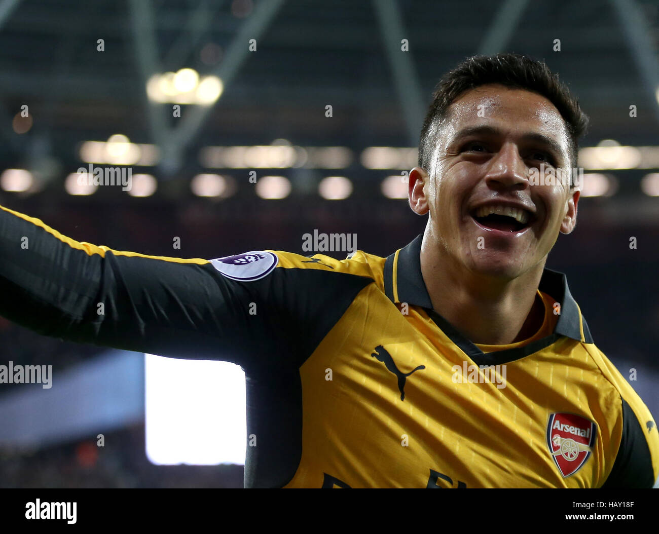Arsenal's Alexis Sanchez celebrates scoring his side's second goal of ...