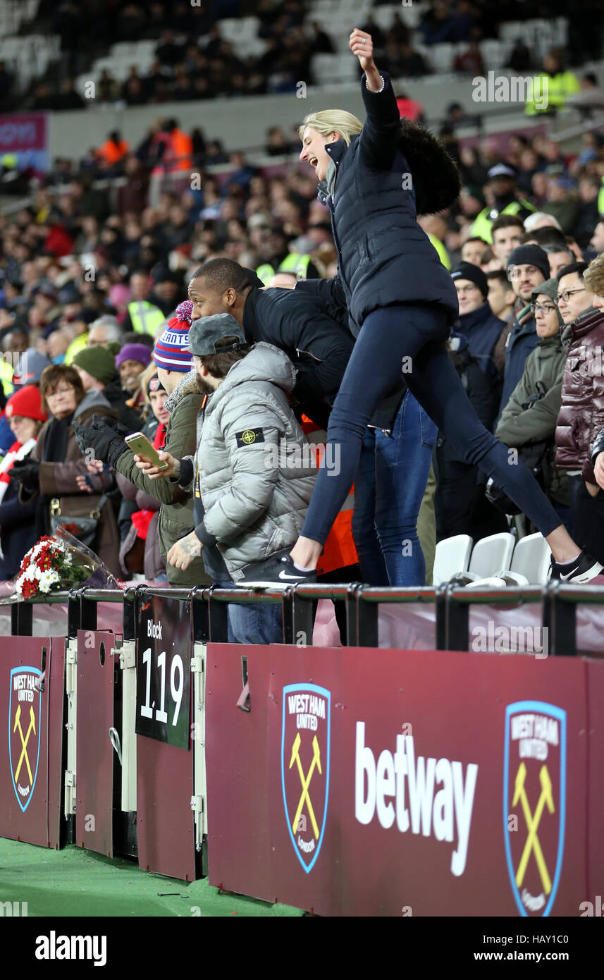 Arsenal fans celebrate after the fourth goal during the Premier League ...