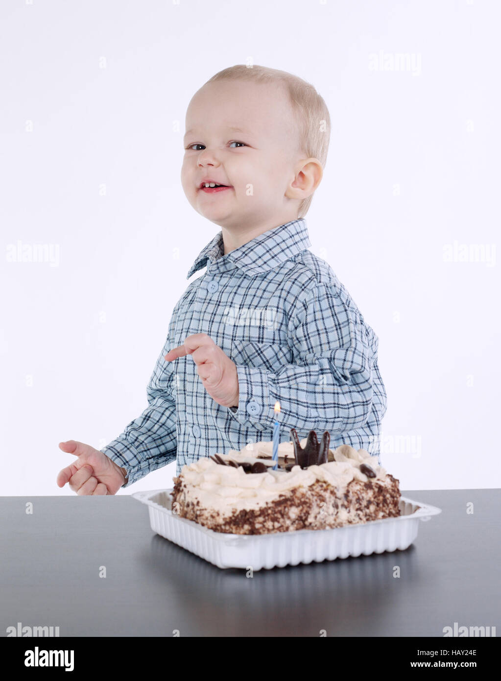 cute little boy with birthday cake on white Stock Photo - Alamy