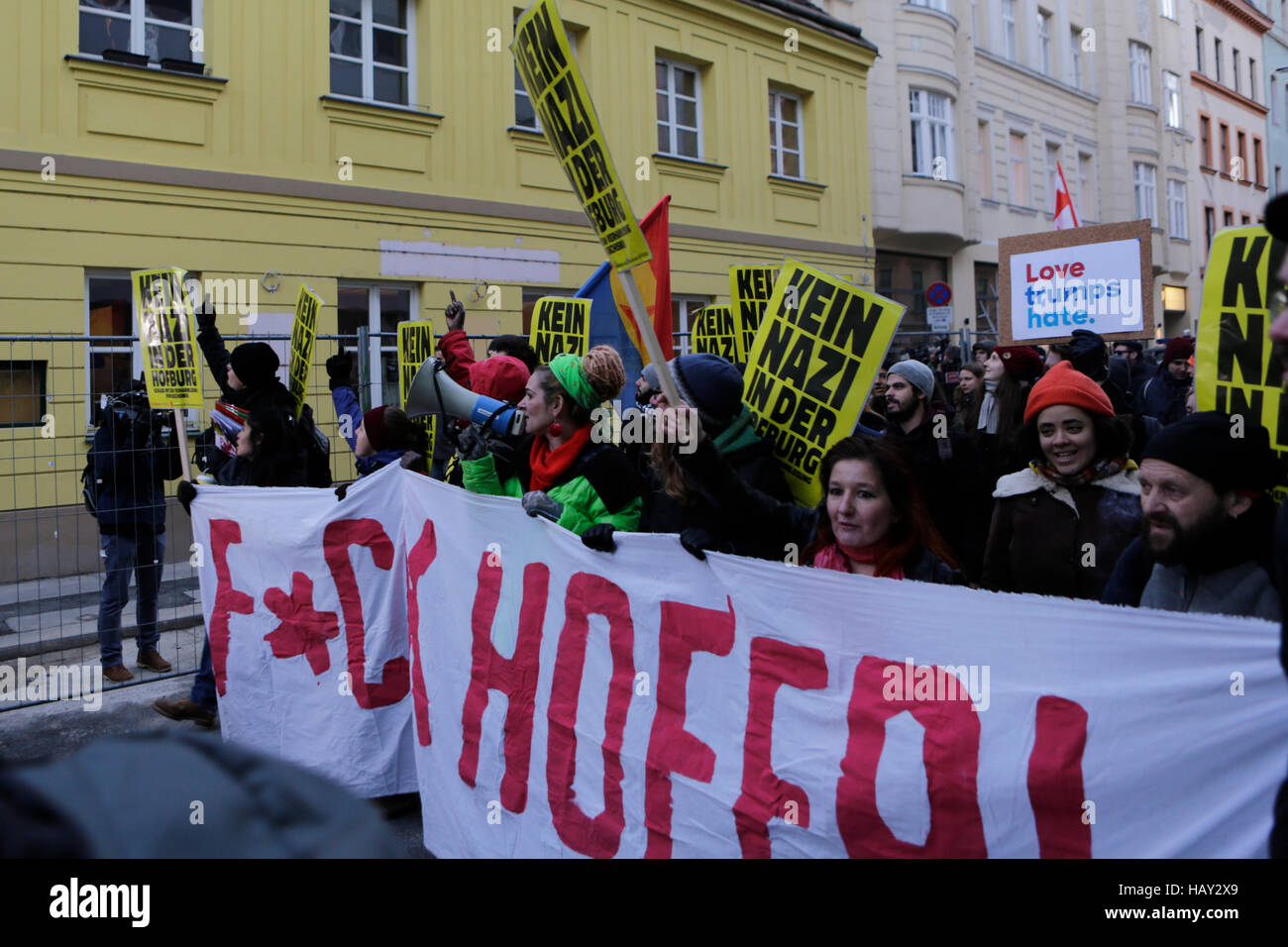 Vienna, Austria. 03rd Dec, 2016. Protesters march past the house of the ...
