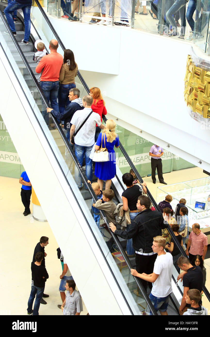 people on the escalator in the supermarket in Chernihiv Stock Photo - Alamy