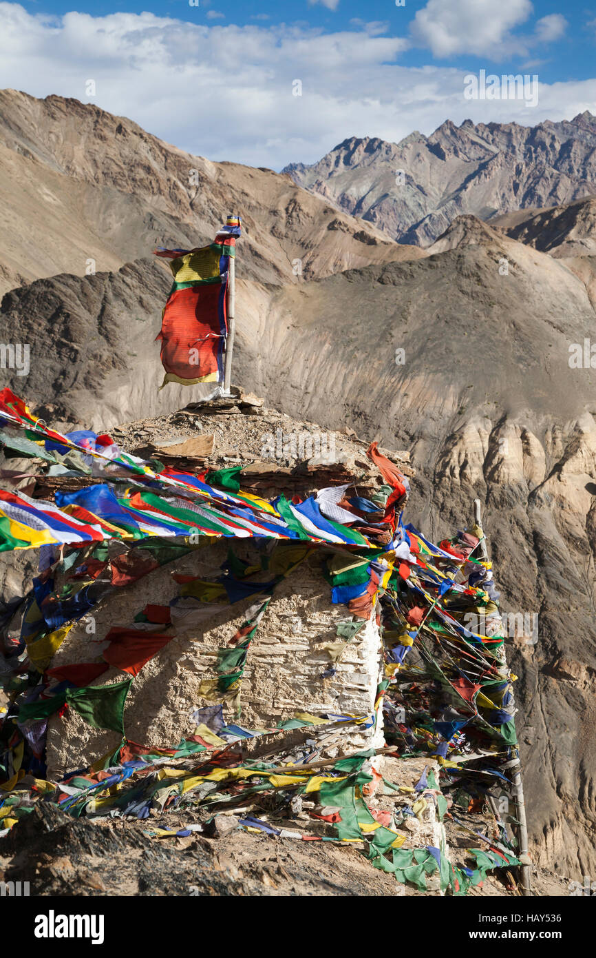 Buddhist prayer flags and stupa above Lamayura monastery in Ladakh ...