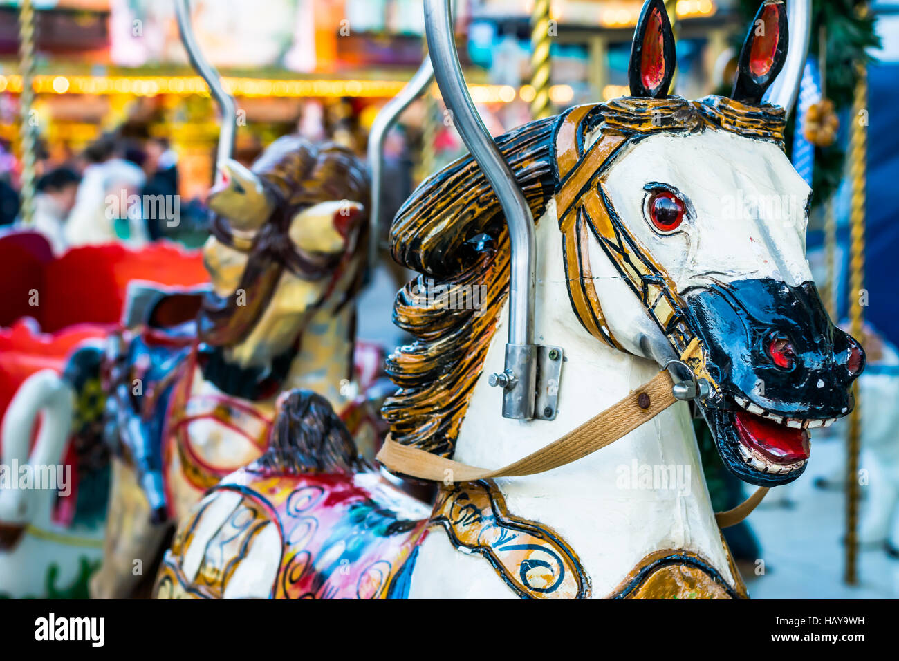 Children's merry-go-round with horse Stock Photo - Alamy