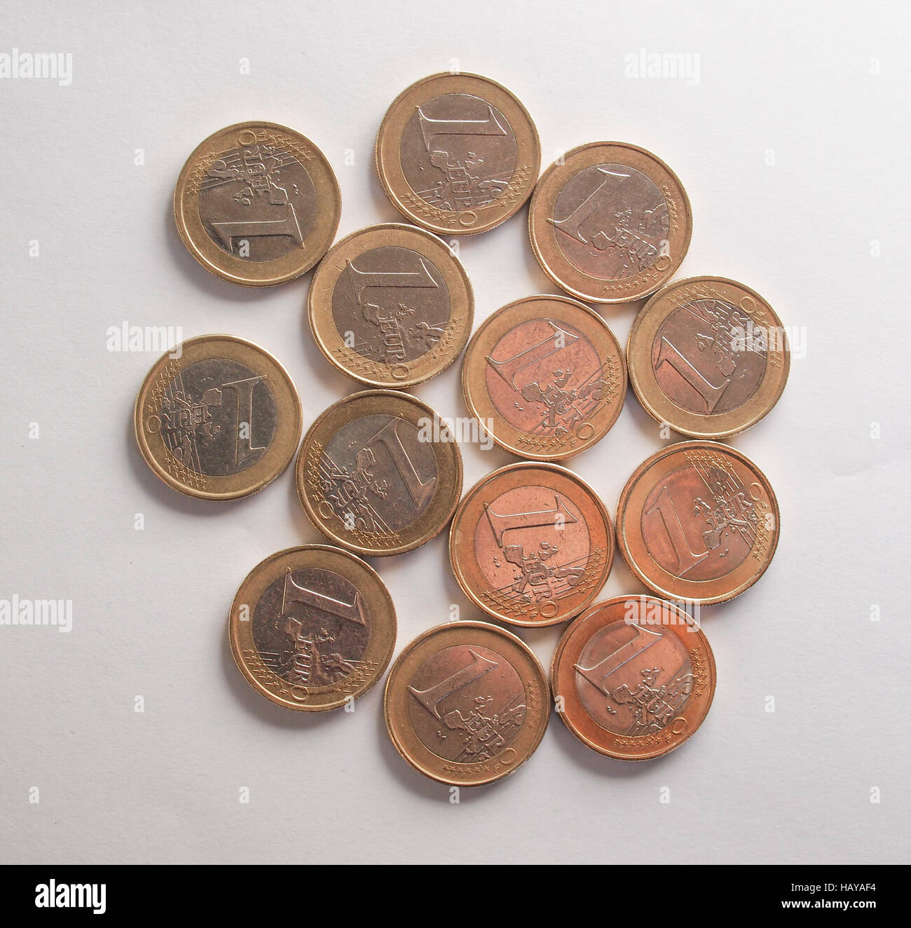 Many one Euro coins Stock Photo - Alamy