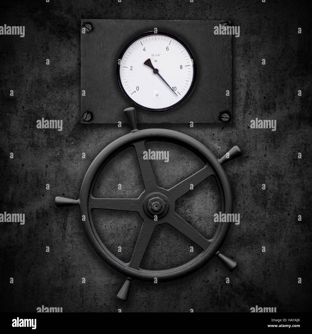 control board with valve and pressure gauge on black steel background ...
