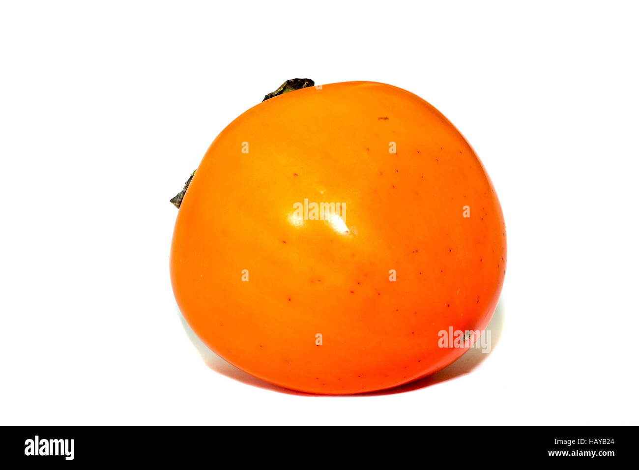 persimmon on a white background juicy few pieces Stock Photo - Alamy