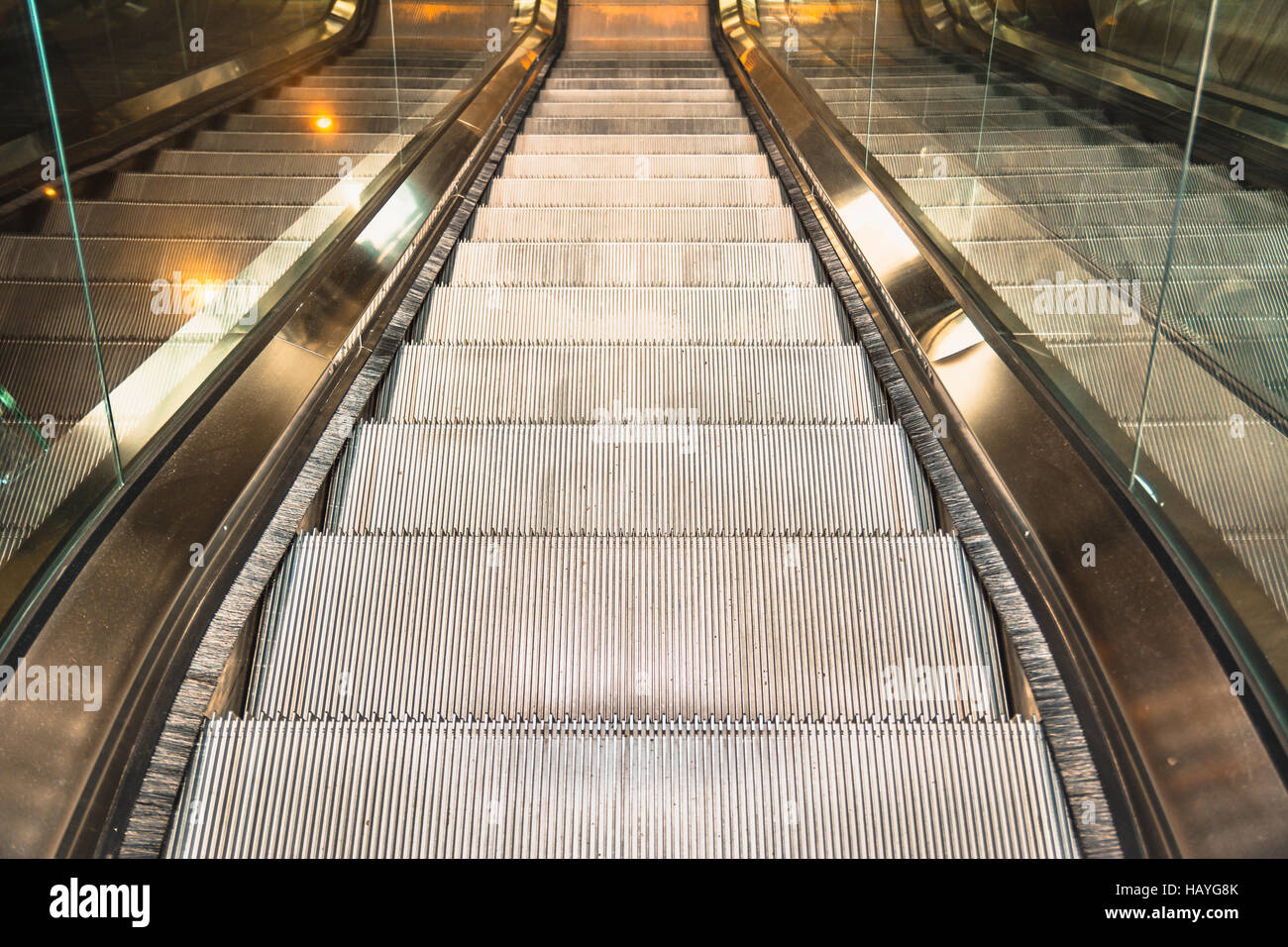 Modern escalator in shopping mall Stock Photo - Alamy