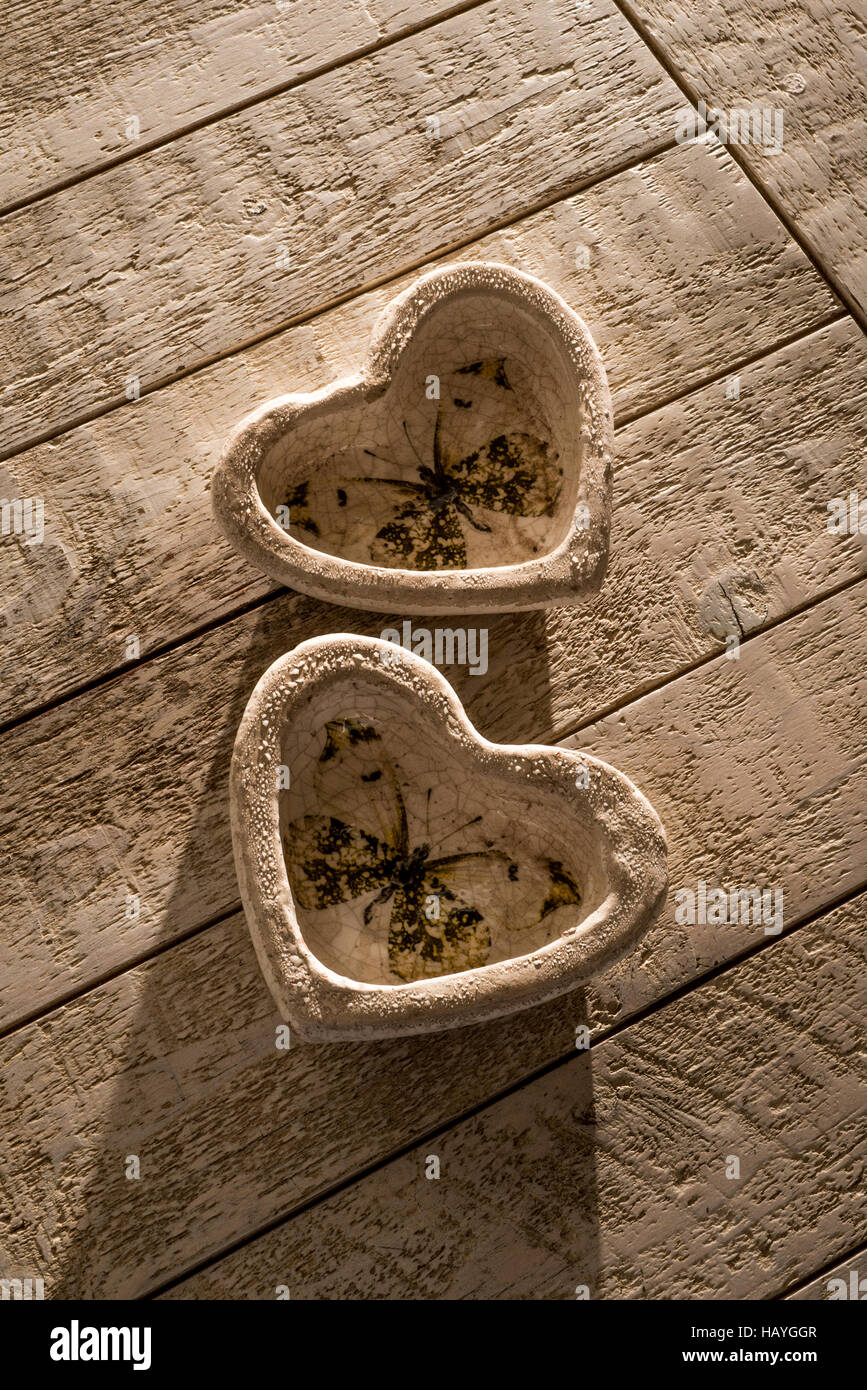 Two Hearts on Table Stock Photo - Alamy