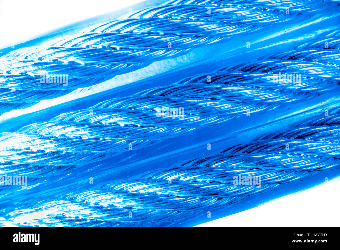 Three Lines of Blue Cable Stock Photo - Alamy