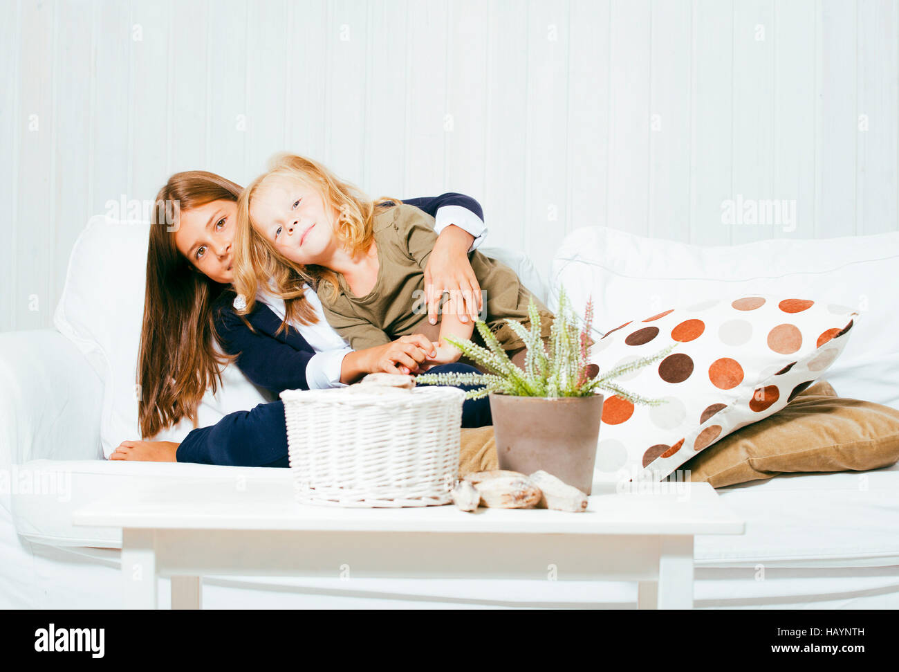 two cute sisters at home playing, little girl in house interior Stock ...