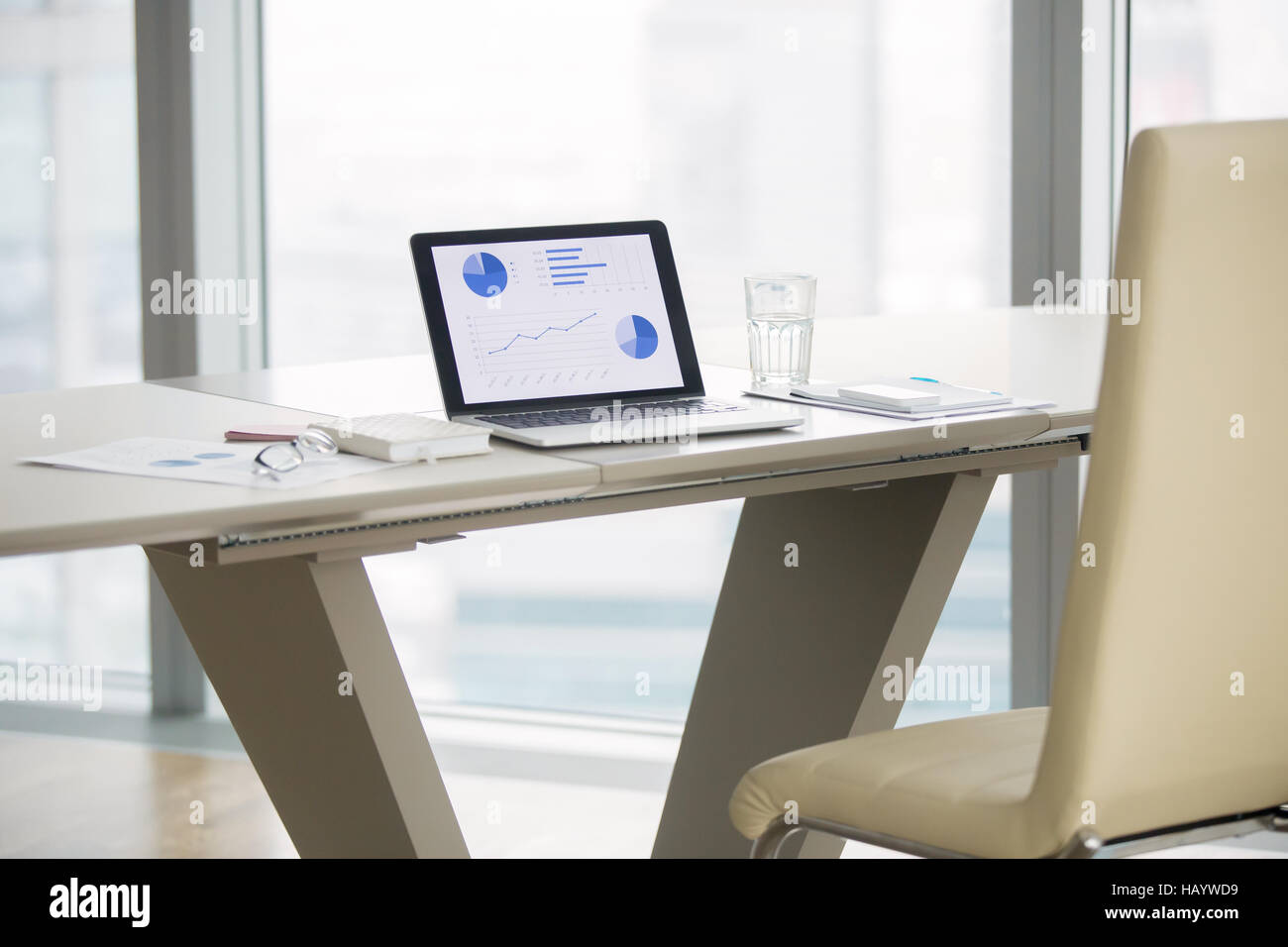 Laptop on a modern office desk Stock Photo - Alamy