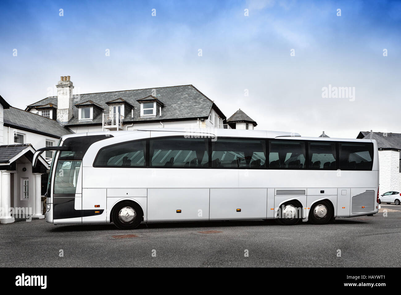 Tour bus parked outdoors Stock Photo - Alamy