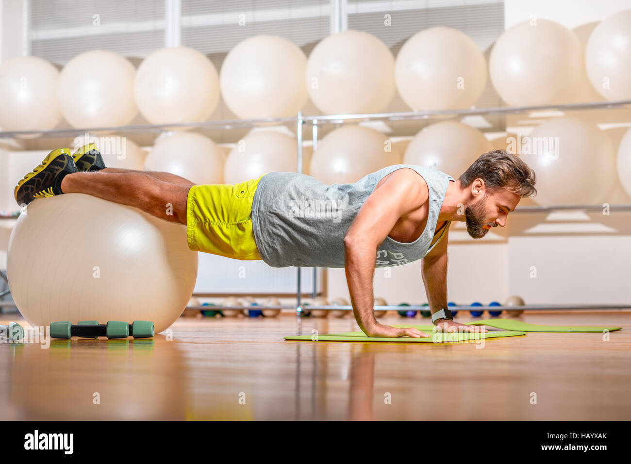 Man exercising with fitball Stock Photo - Alamy