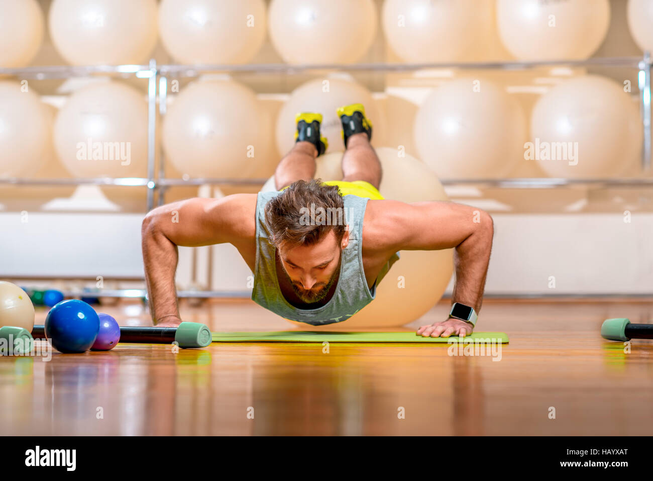Man exercising with fitball Stock Photo - Alamy
