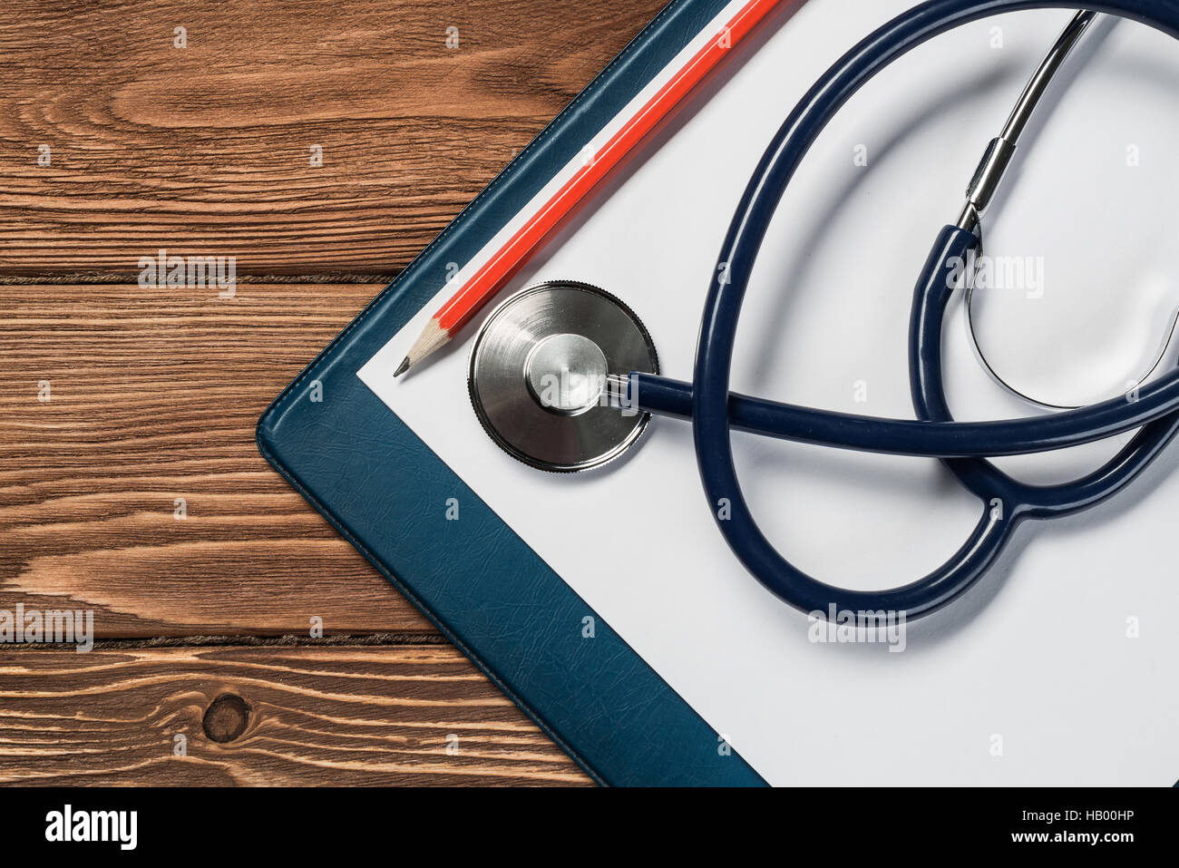 Desk of doctor with medicine things Stock Photo - Alamy