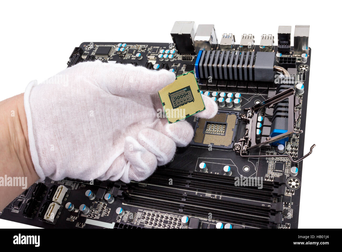 Installation of modern processor in CPU socket Stock Photo - Alamy