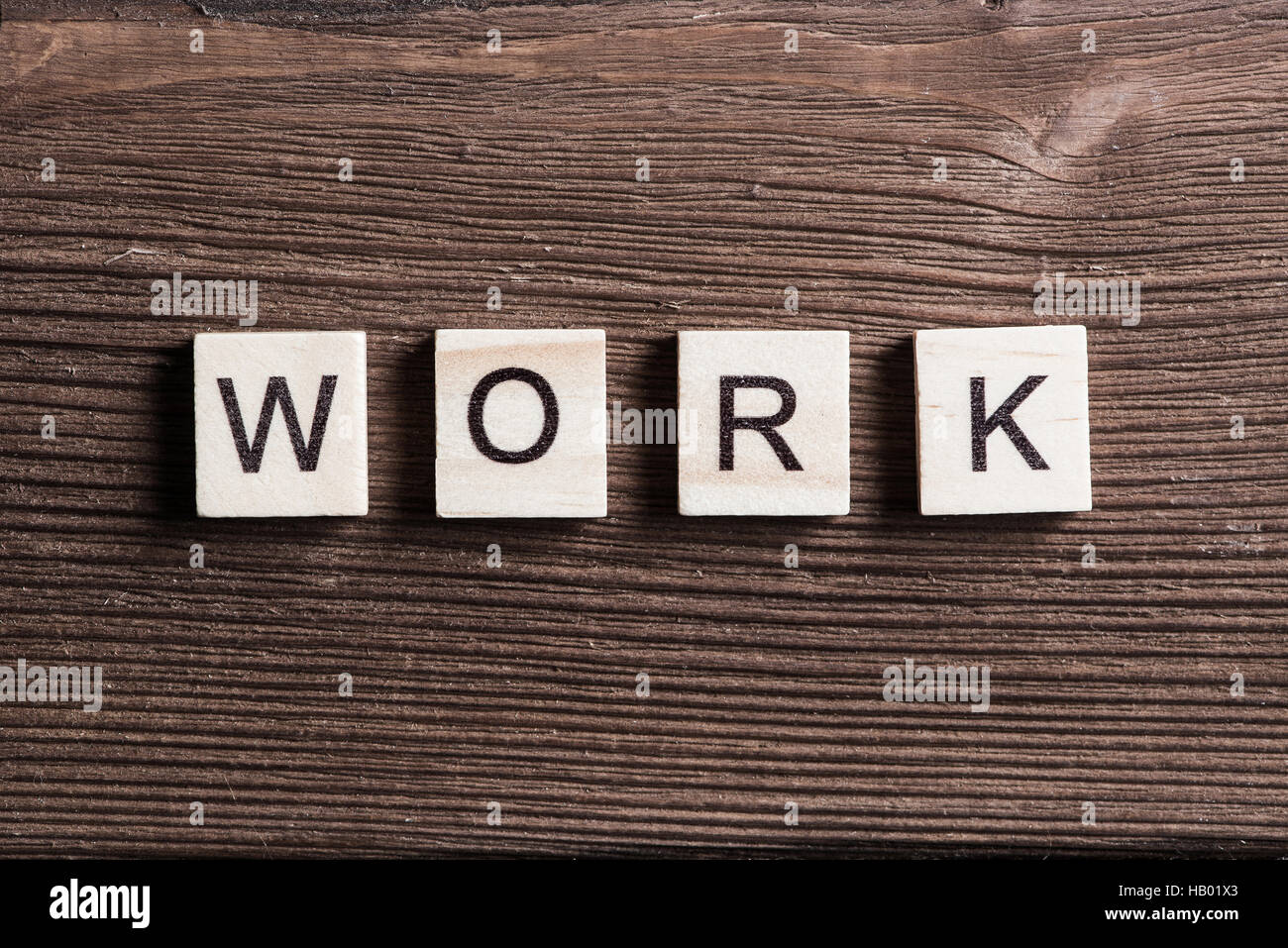 wooden elements with word work Stock Photo - Alamy