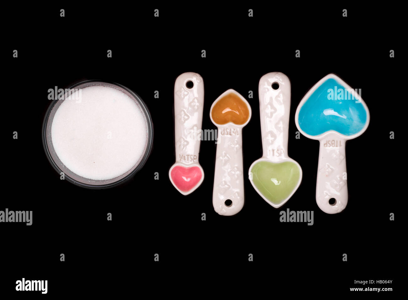 Measuring Spoons with Sugar Stock Photo - Alamy