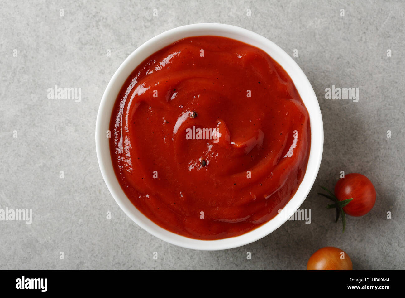 Season tomato sauce hi-res stock photography and images - Alamy