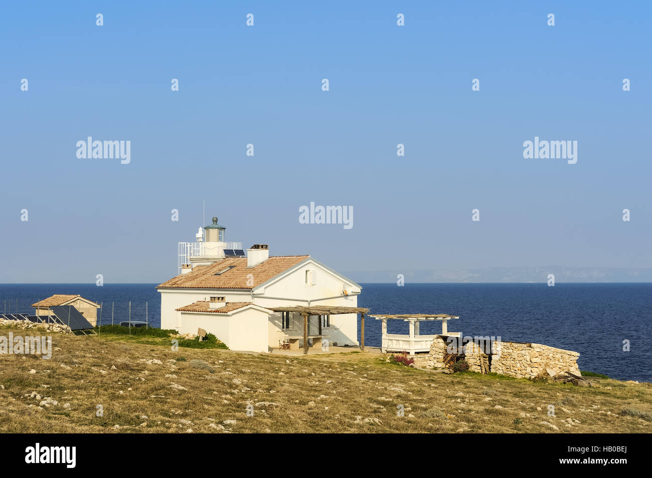 Lighthouse and house rental Stock Photo - Alamy