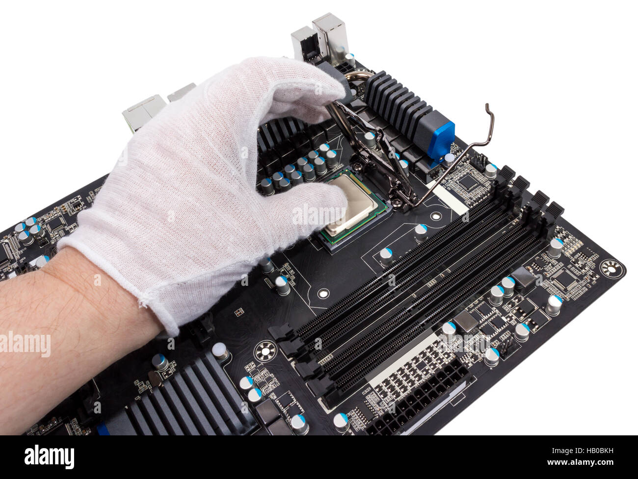 Installation of modern processor in CPU socket Stock Photo - Alamy