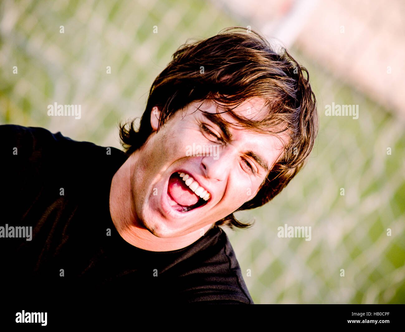 Male athlete yelling Stock Photo - Alamy