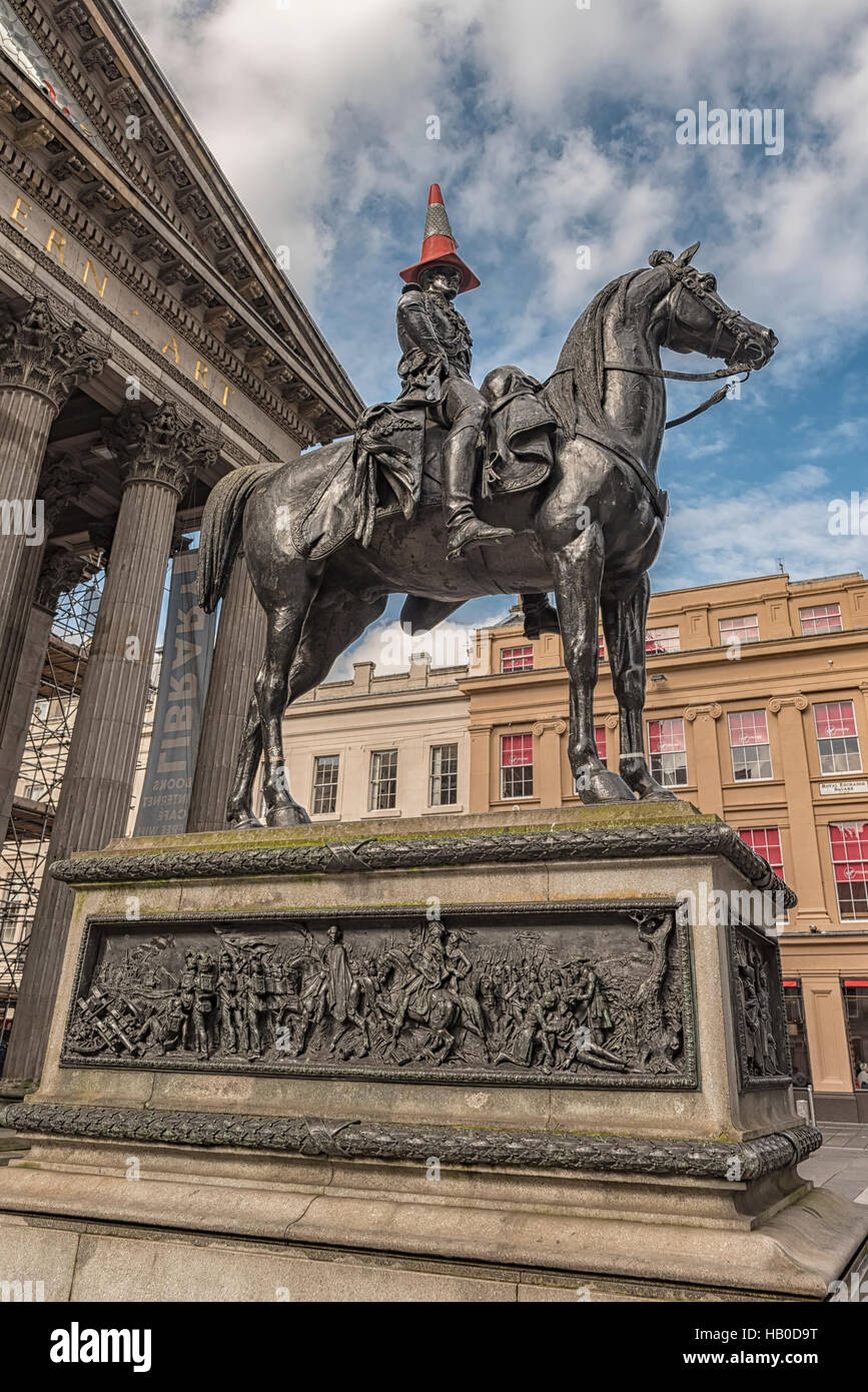 Statue of Duke of Wellington, riding a horse, wearing a traffic cone on ...