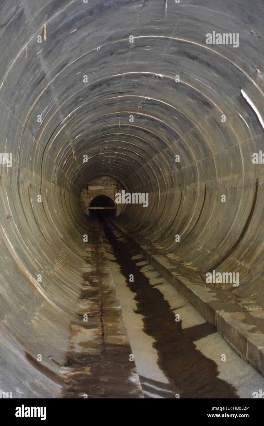 Urban exploration inside a tunnel Stock Photo - Alamy