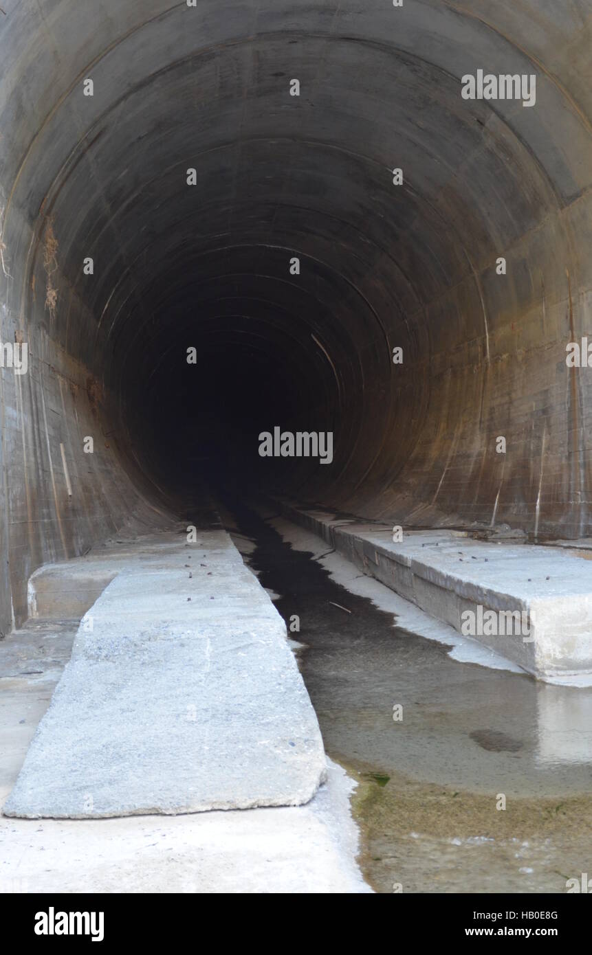 Urban exploration inside a tunnel Stock Photo - Alamy