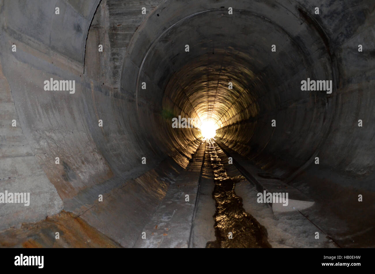 Urban exploration inside a tunnel Stock Photo - Alamy