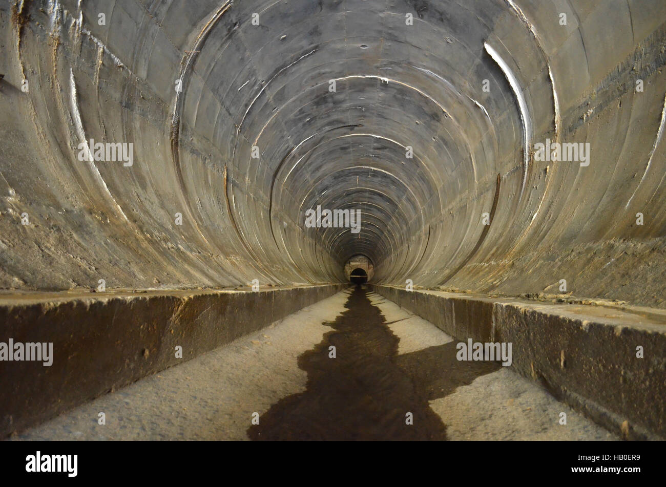 Urban exploration inside a tunnel Stock Photo - Alamy
