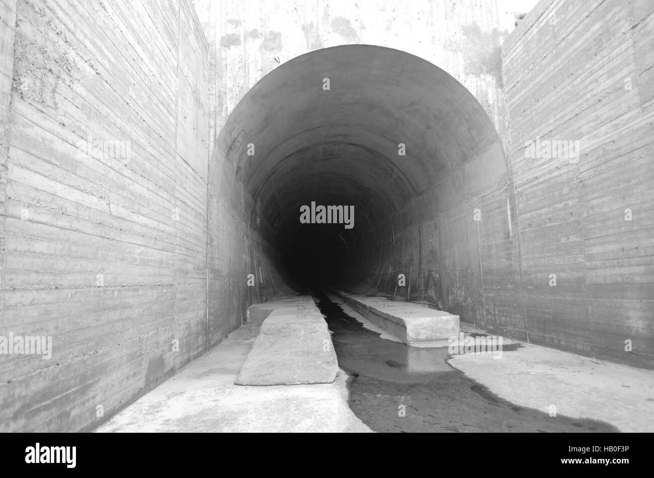 Urban exploration inside a tunnel Stock Photo - Alamy