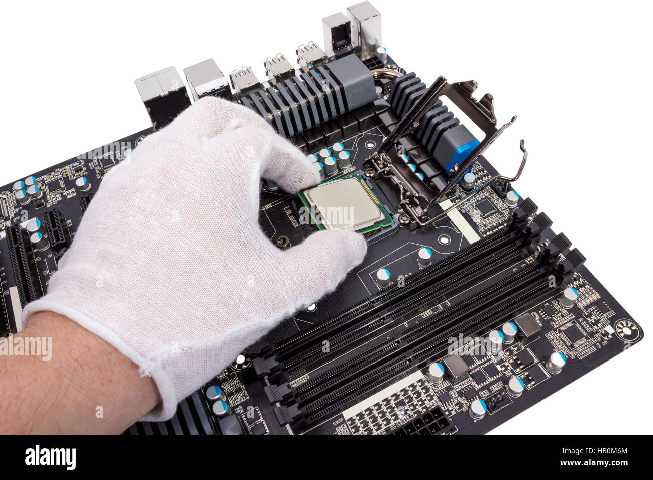 Installation of modern processor in CPU socket Stock Photo - Alamy