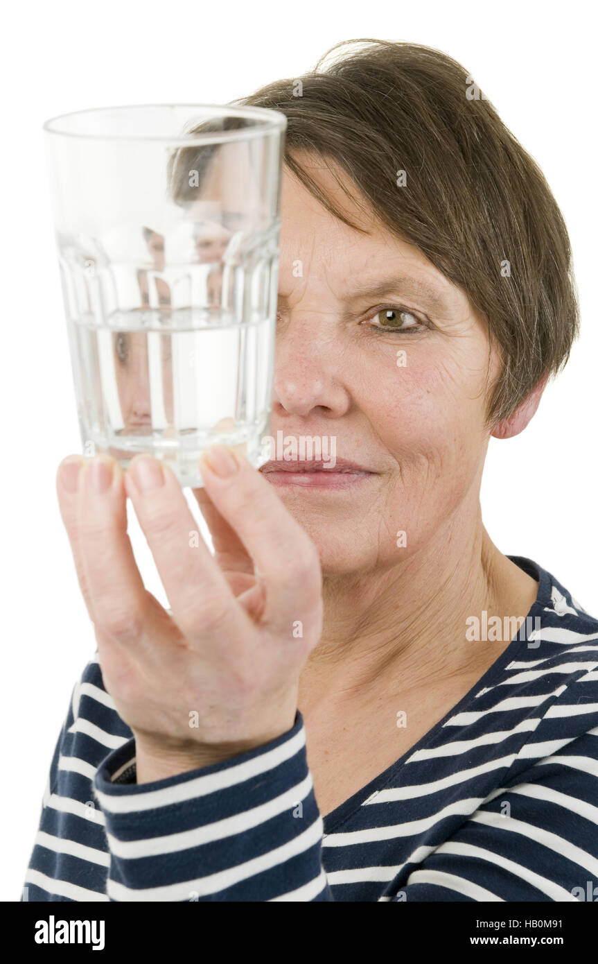 Looking through a glass of water Stock Photo - Alamy