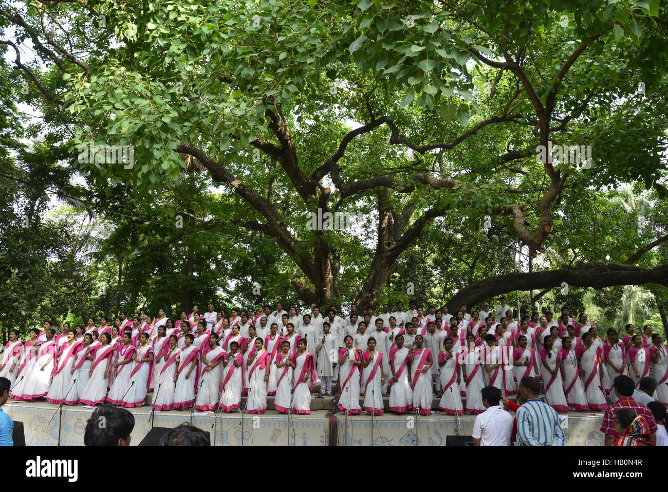 Artists are singing traditional bengali songs at Ramna Batamul song as ...