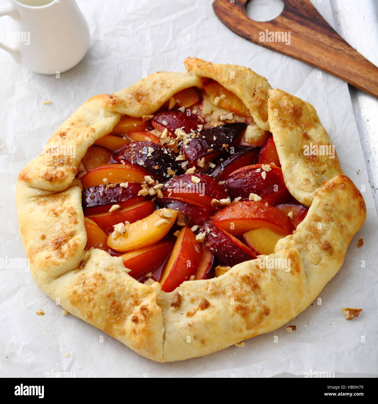 Fruits pie with nuts, pastry closeup Stock Photo - Alamy