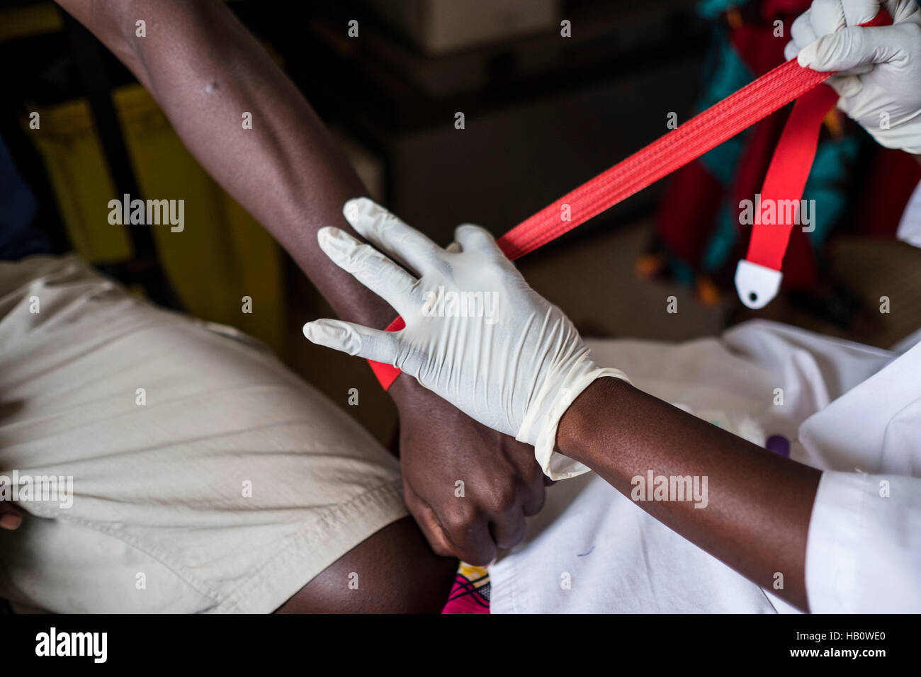 DIOILA - MALI: A patient is ready to donate blood at the blood unit of ...