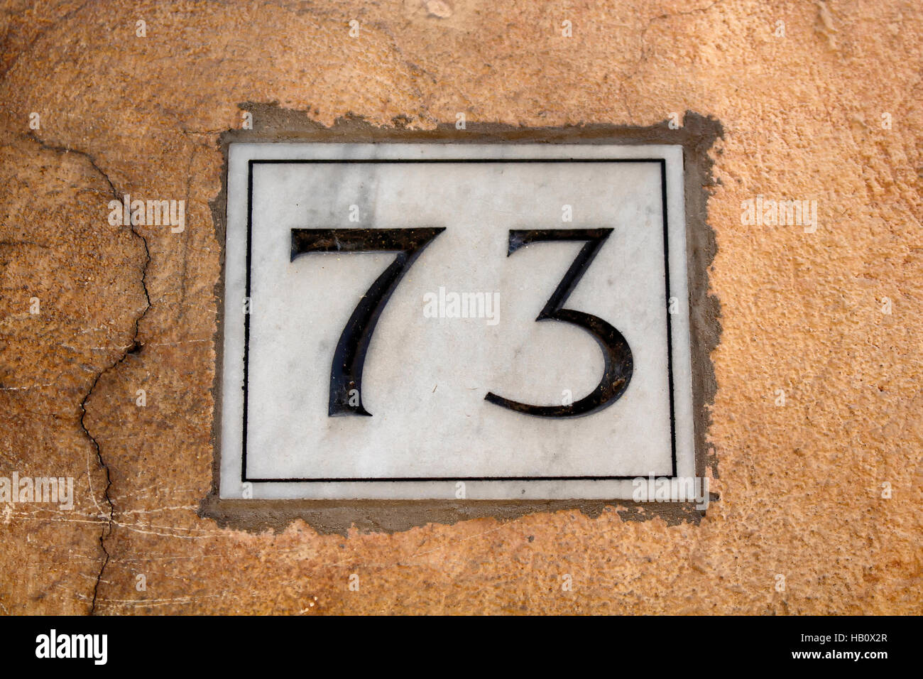 View of a building number (73) in Rome Stock Photo - Alamy